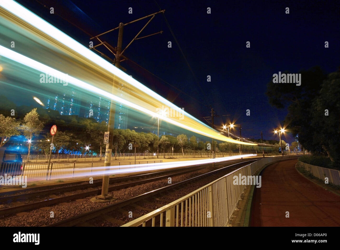Light rail at night Stock Photo - Alamy