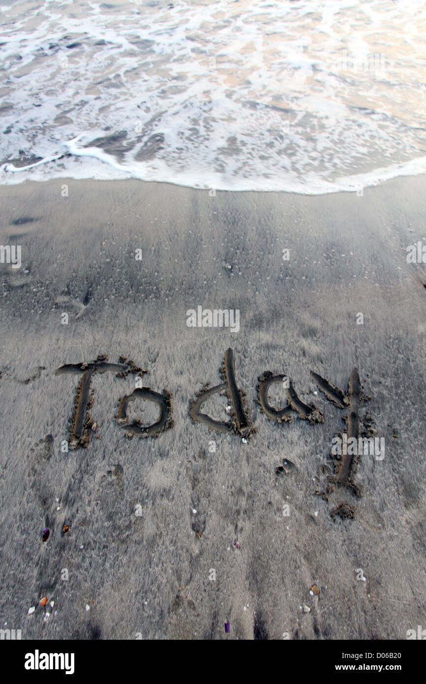Today words on sand Stock Photo - Alamy