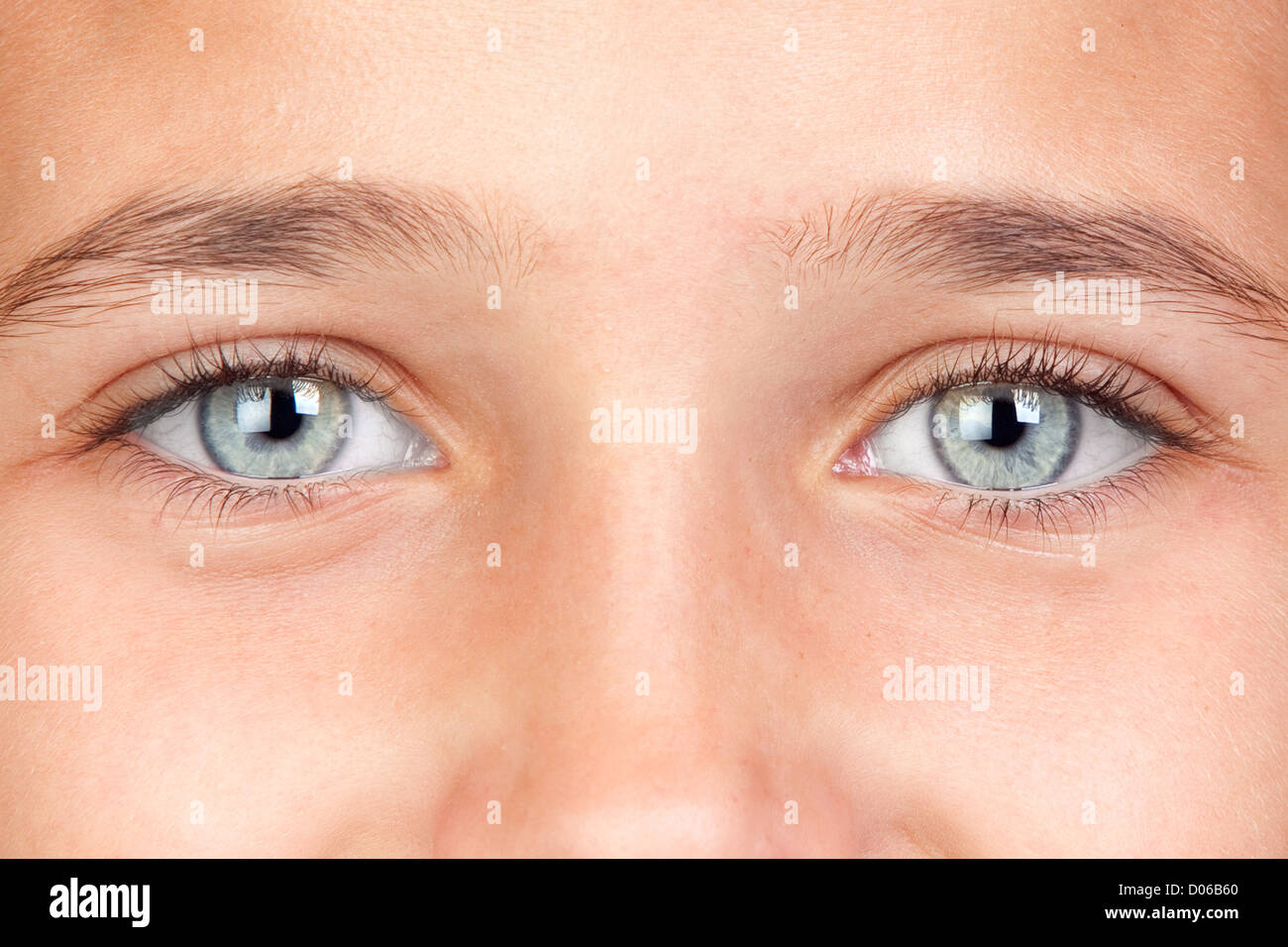 Part of the face of a pretty girl with blue eyes Stock Photo - Alamy