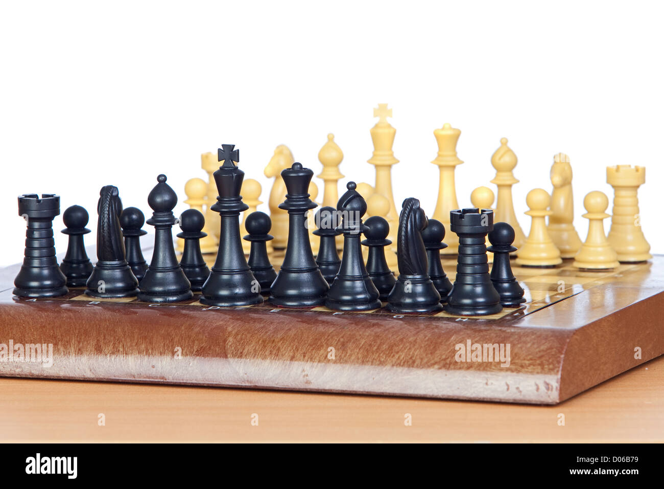 Chess game with all pieces on the board isolated on white background ...