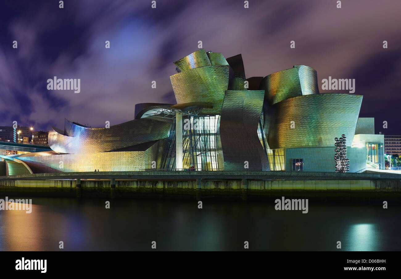 Panoramic night view of the Guggenheim museum and River Nervion, Bilbao ...