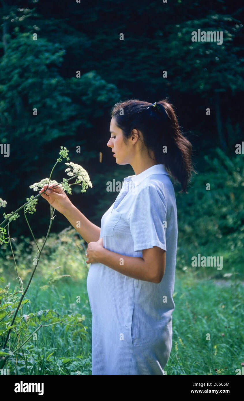 Happy pregnant woman smelling hi-res stock photography and images - Alamy