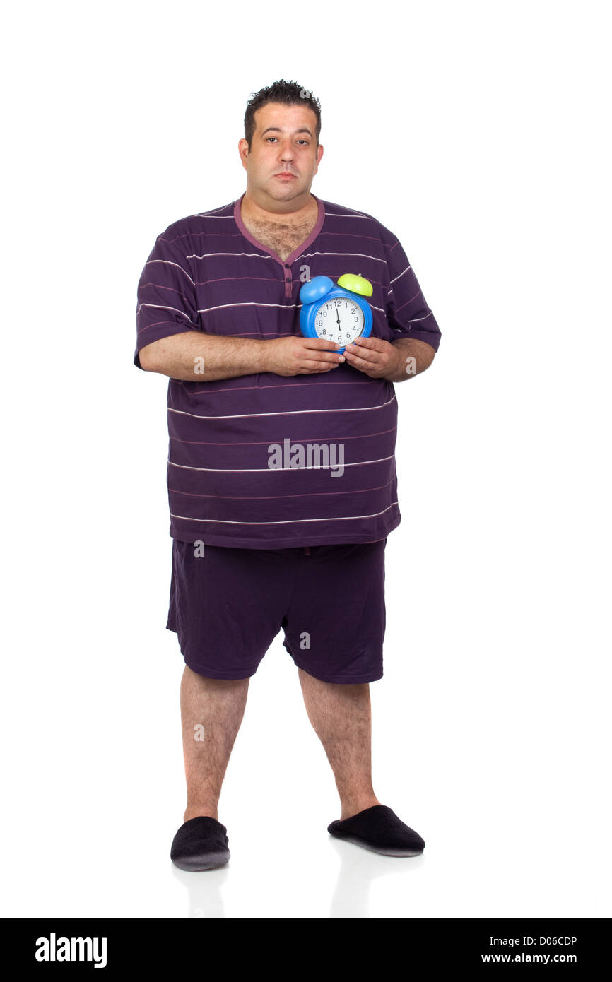 Fat man with a blue alarm clock isolated on white background Stock ...