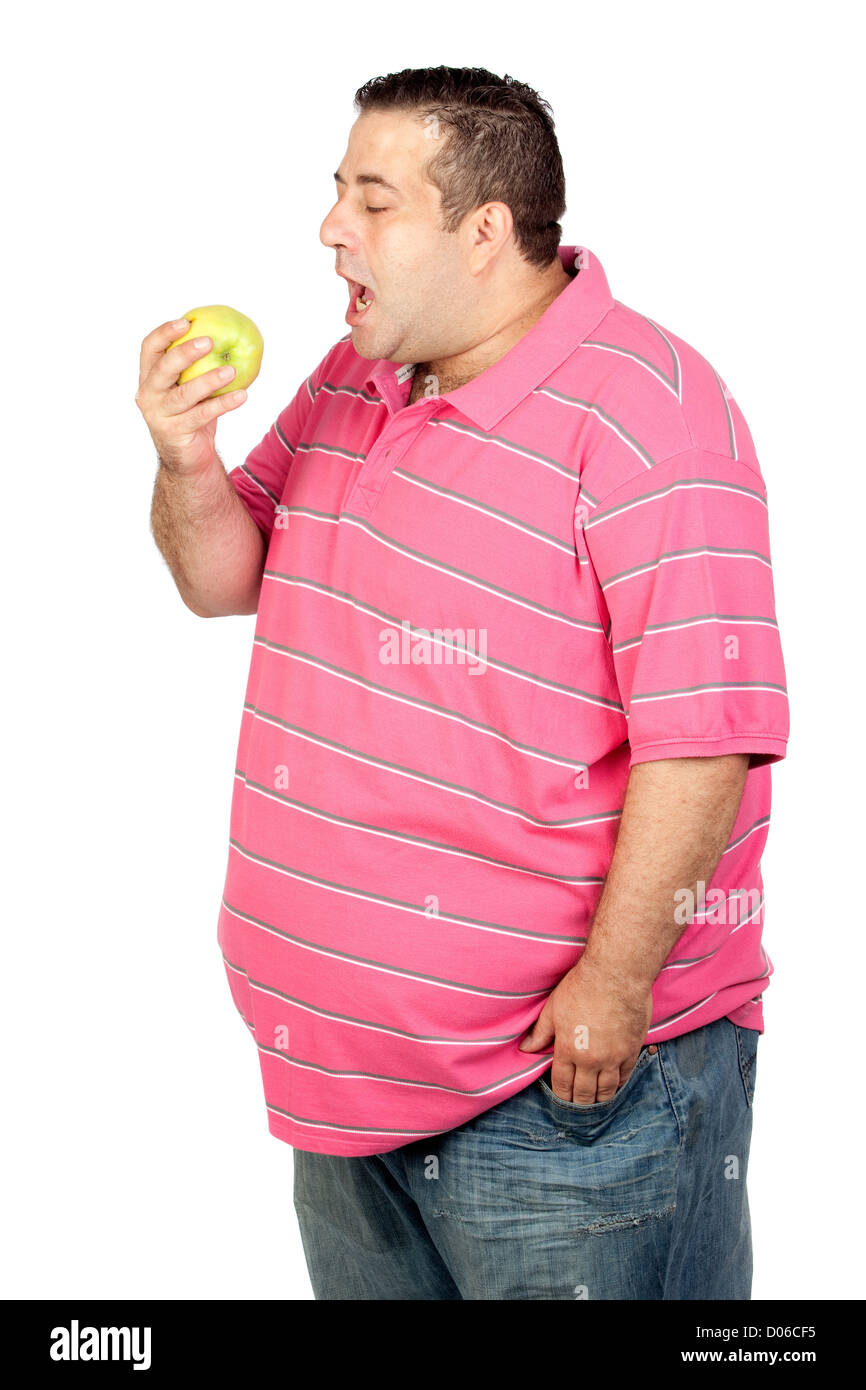 Fat man eating a apple isolated on white background Stock Photo - Alamy