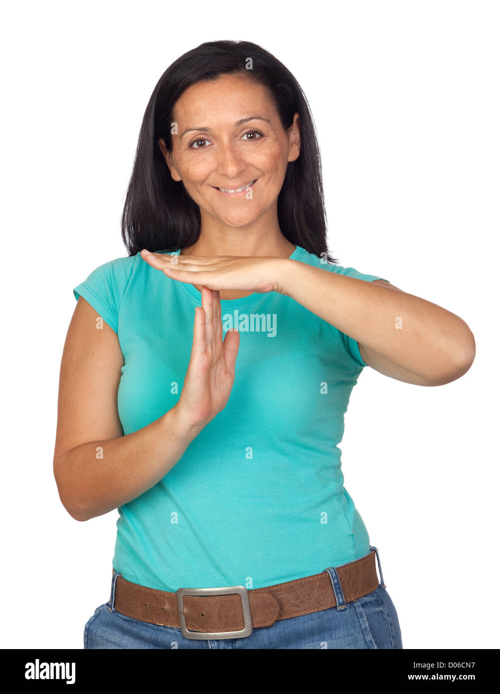 Brunette woman making the symbol of downtime isolated on white ...