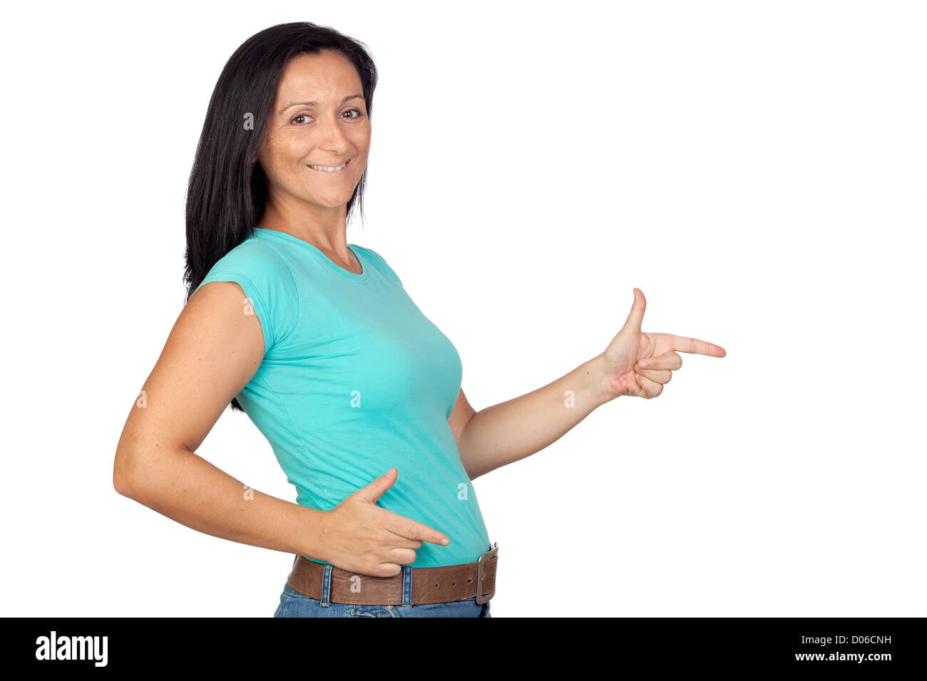 Adorable woman indicating something isolated on a over white background ...
