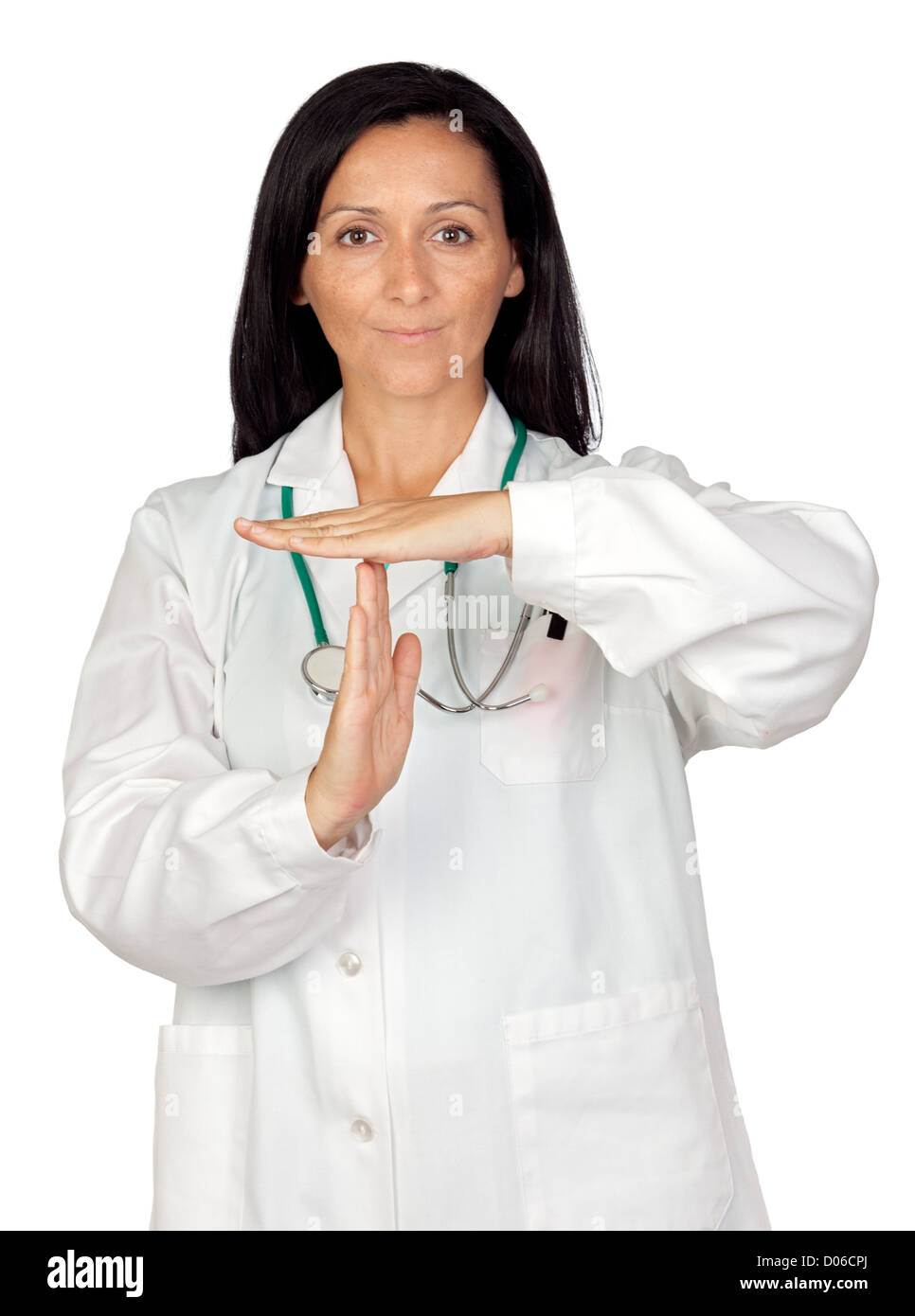 Brunette doctor making signal of downtime isolated on white background ...
