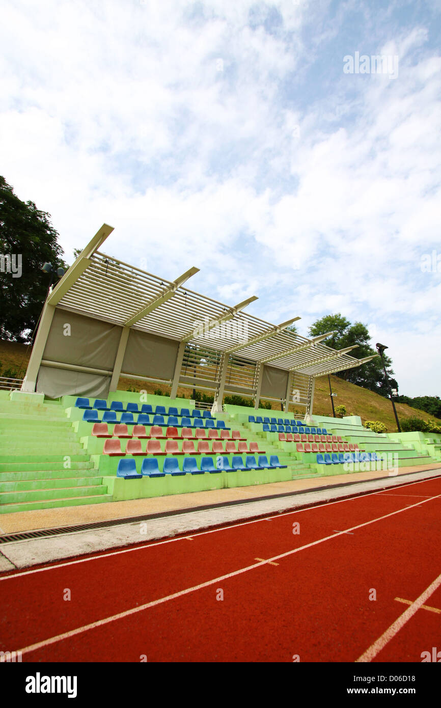 Stadium chairs and running track Stock Photo - Alamy
