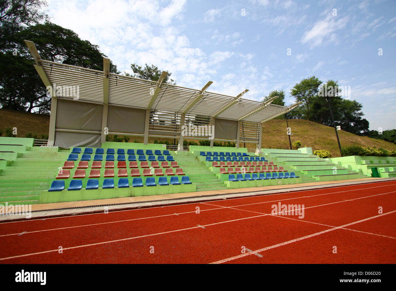 Stadium chairs and running track Stock Photo - Alamy