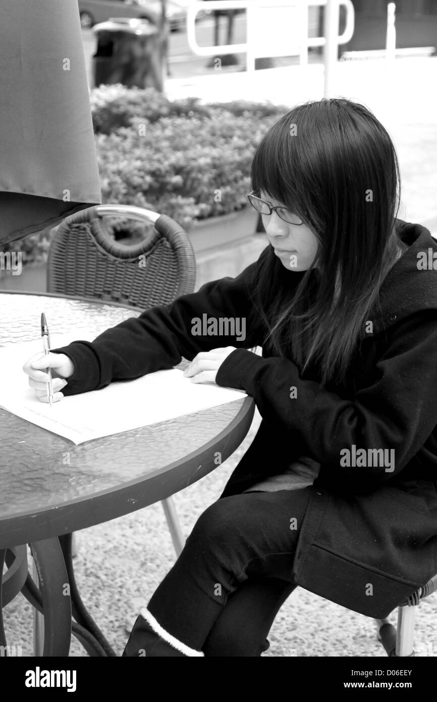 Asian girl studying in university Stock Photo - Alamy