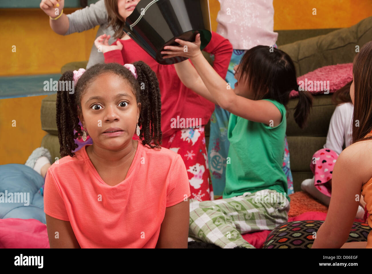 Shocked little African-American kid at a sleepover Stock Photo - Alamy