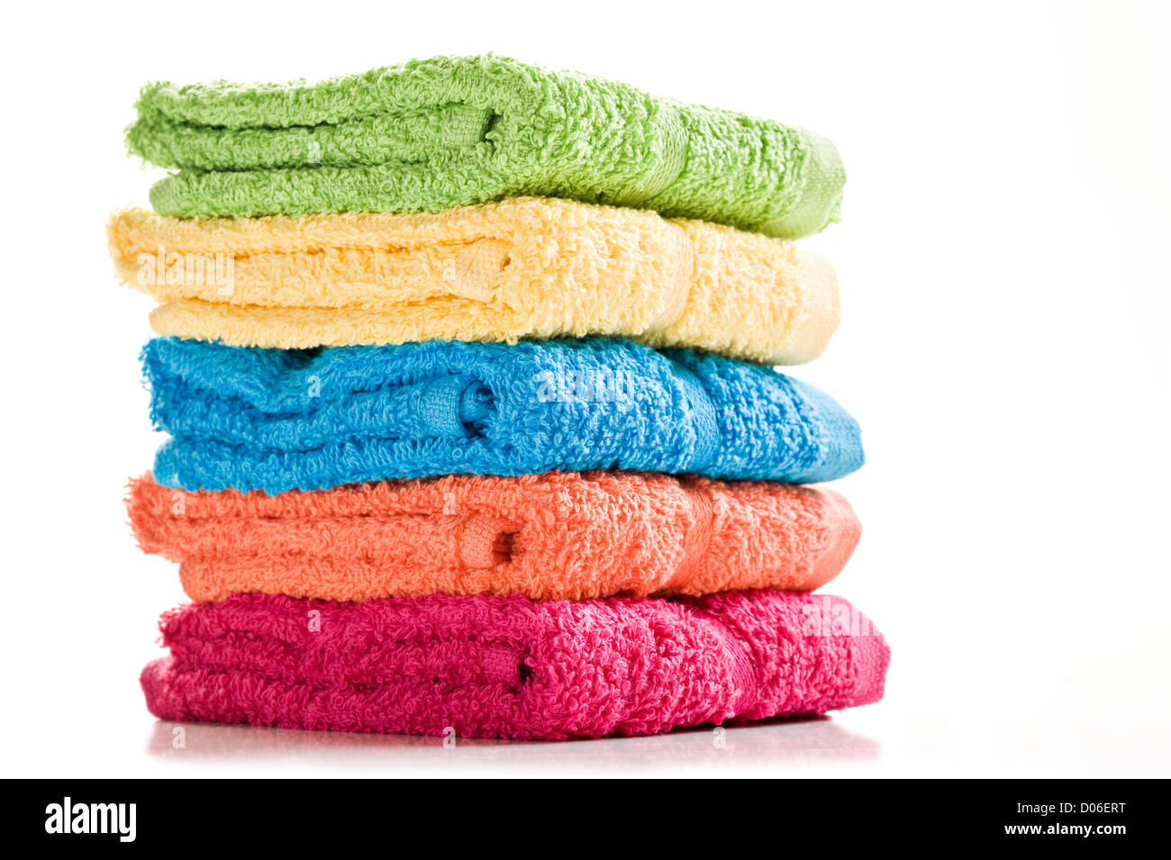 Colorful towels on a white background with space for text Stock Photo ...
