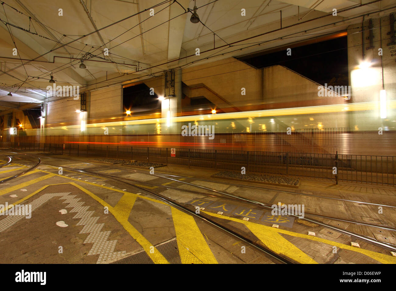 Light rail in Hong Kong at night Stock Photo - Alamy