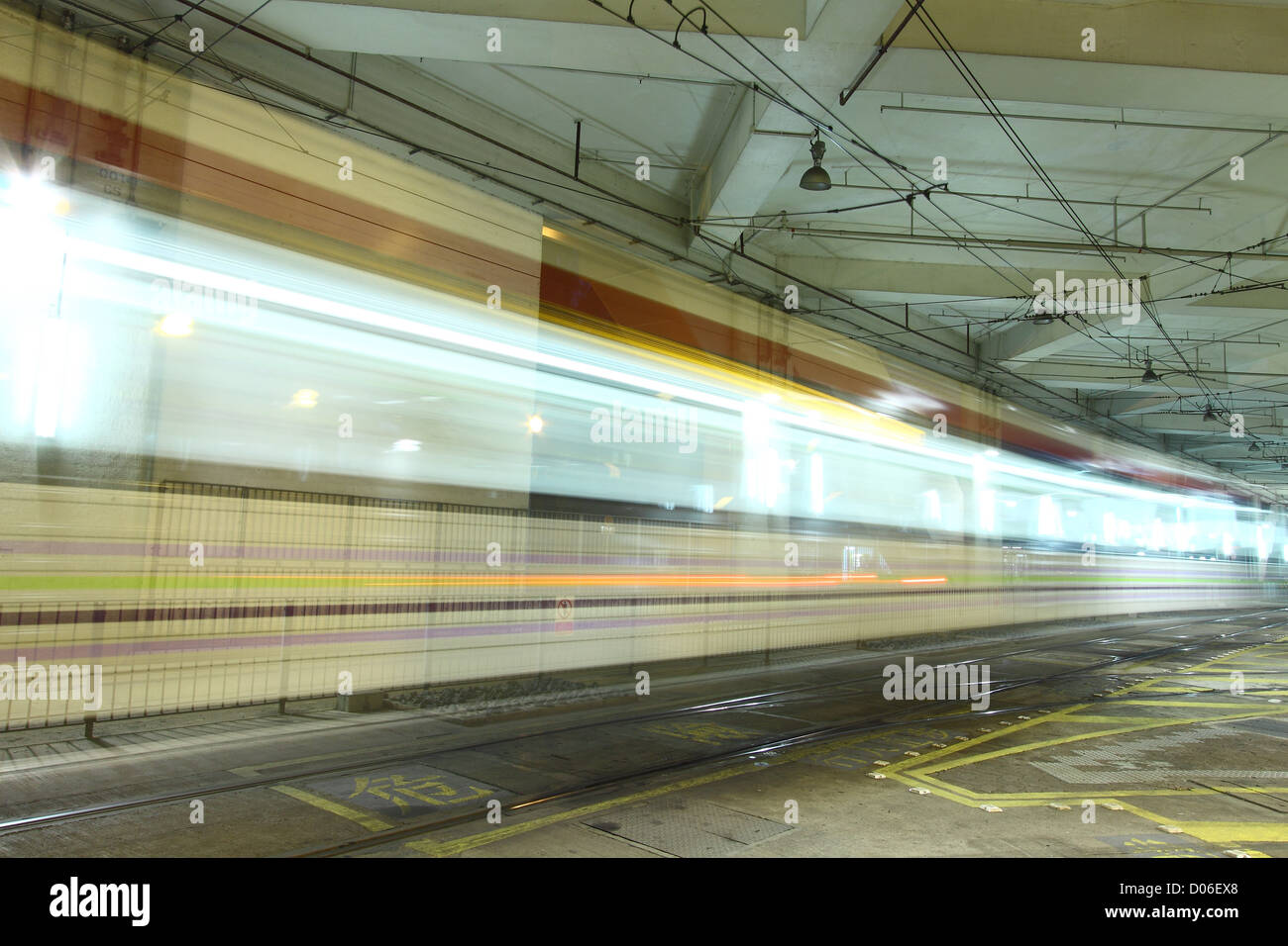 Light rail in Hong Kong at night Stock Photo - Alamy