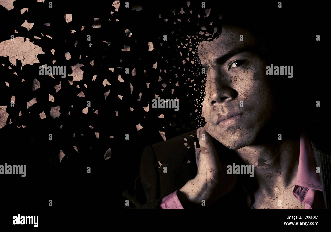 Lonely Asian businessman with shatter face and sad expression in dark ...