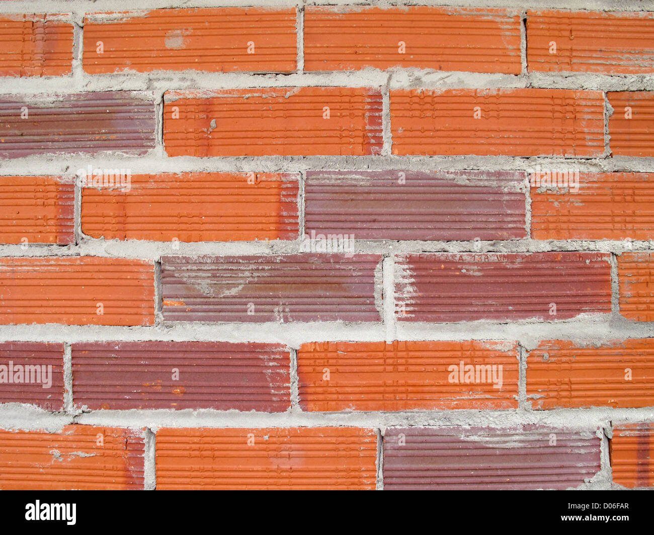 Photo of a plain red Brick wall for background Stock Photo - Alamy