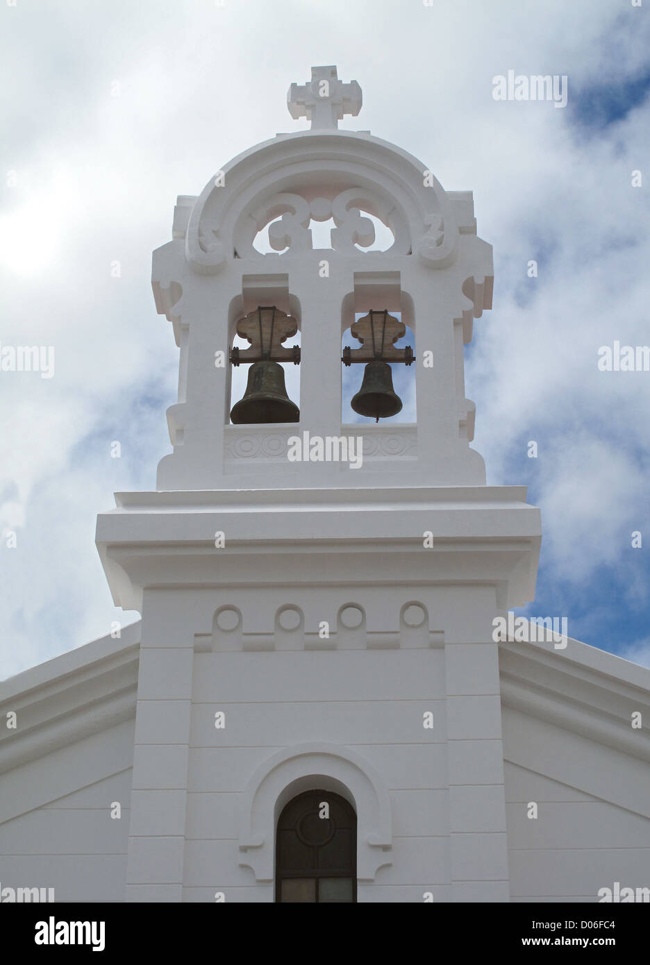 Simple white bell tower of a church Stock Photo - Alamy