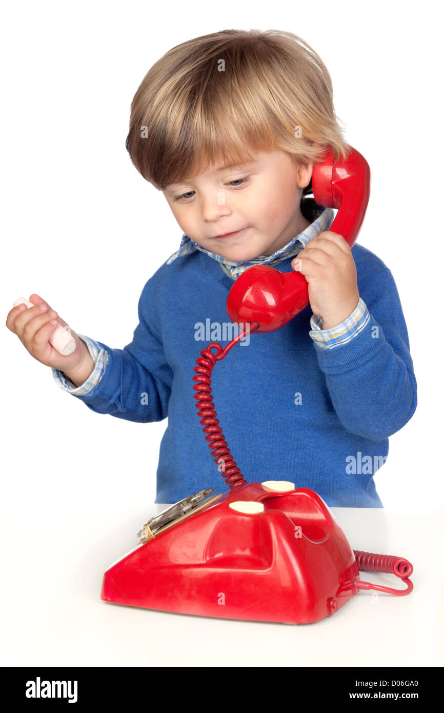 Beautiful baby with a red phone isolated on white background Stock ...