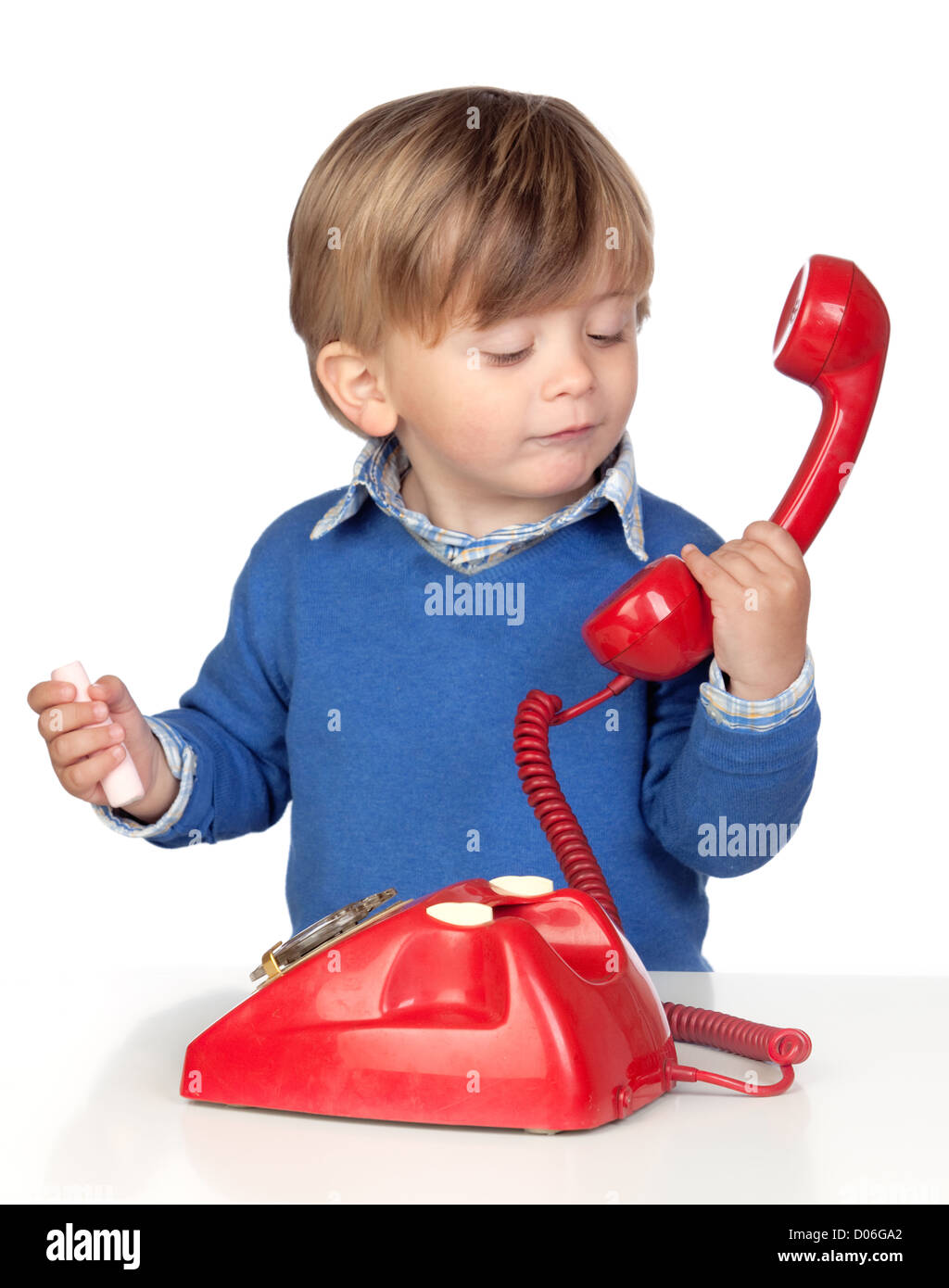 Beautiful baby with a red phone isolated on white background Stock ...