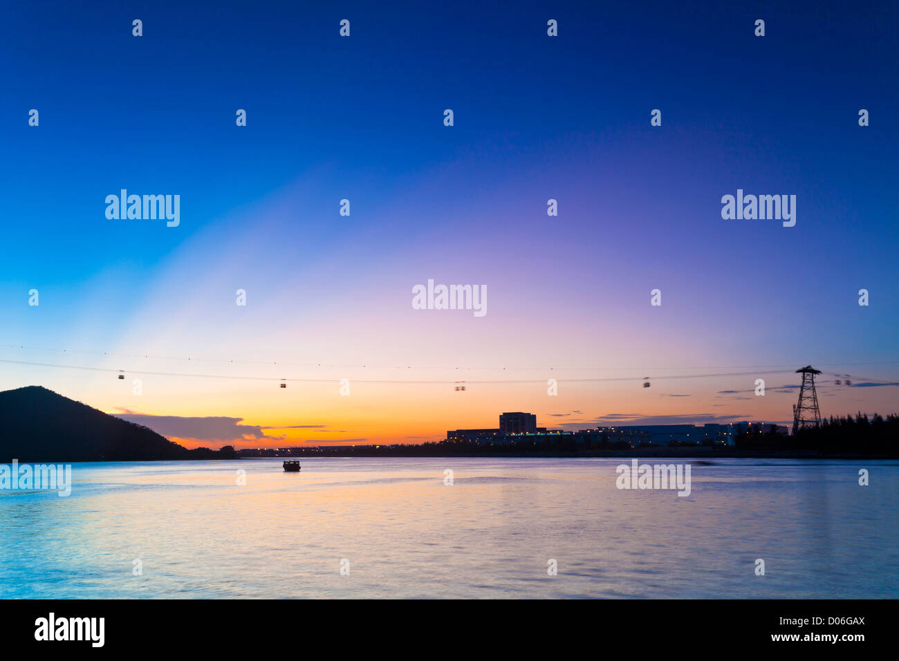 Sunset at coast with cable cars background Stock Photo - Alamy