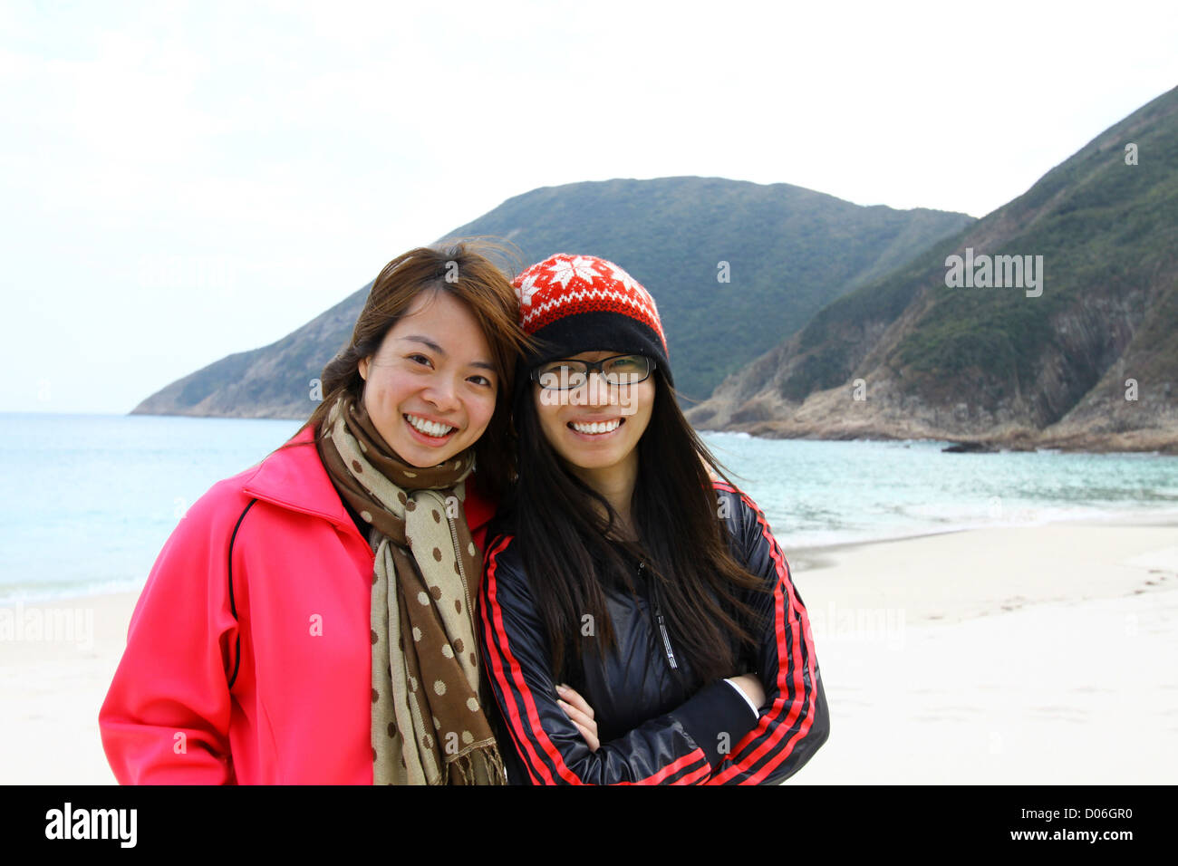 Two happy asian friends Stock Photo - Alamy