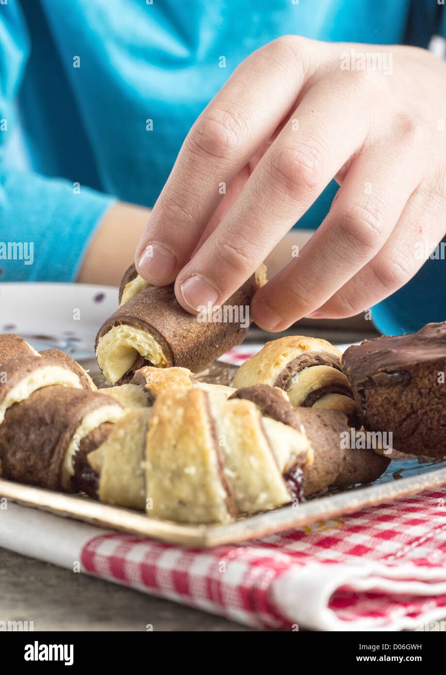 Hand reaching for cookies,close up Stock Photo - Alamy