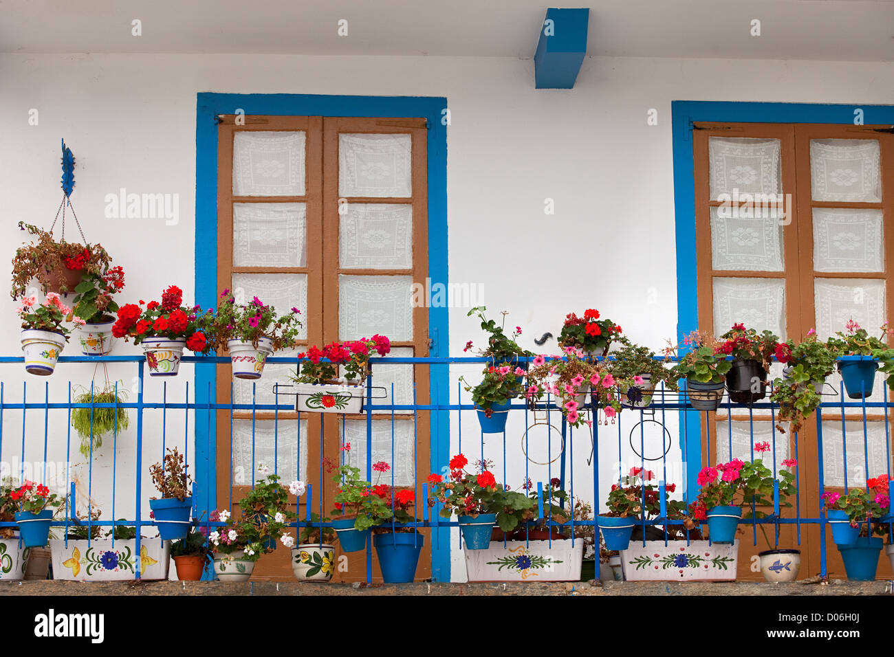 Wooden balcony geraniums hi-res stock photography and images - Alamy
