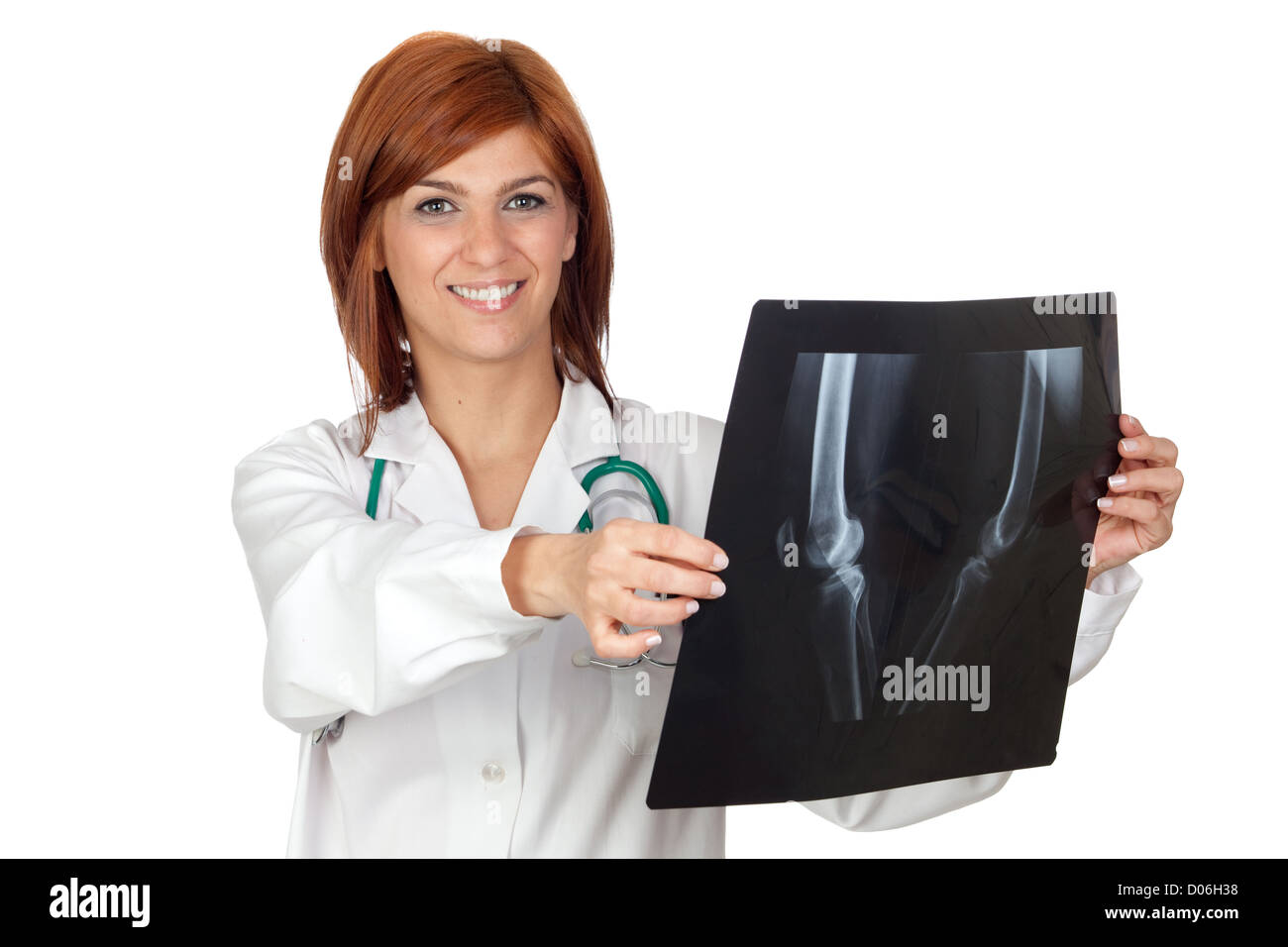 Attractive doctor looking a radiography isolated on a over white ...