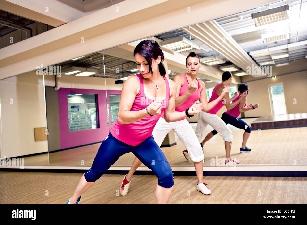 young woman in sport dress at training Stock Photo - Alamy