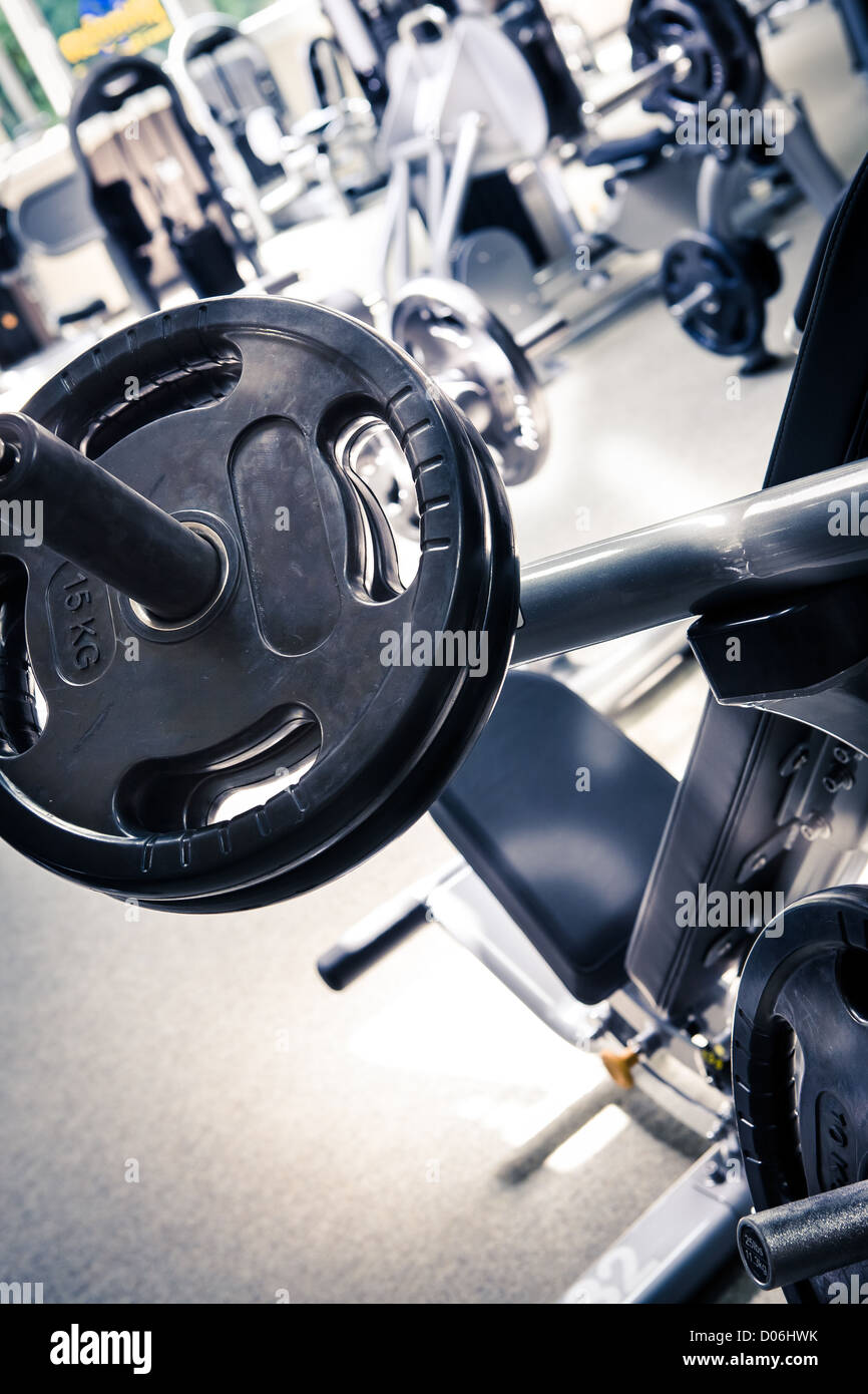 diverse equipment and machines at the gym room Stock Photo - Alamy