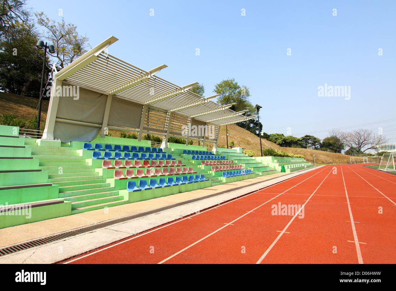Stadium seats and running track Stock Photo - Alamy