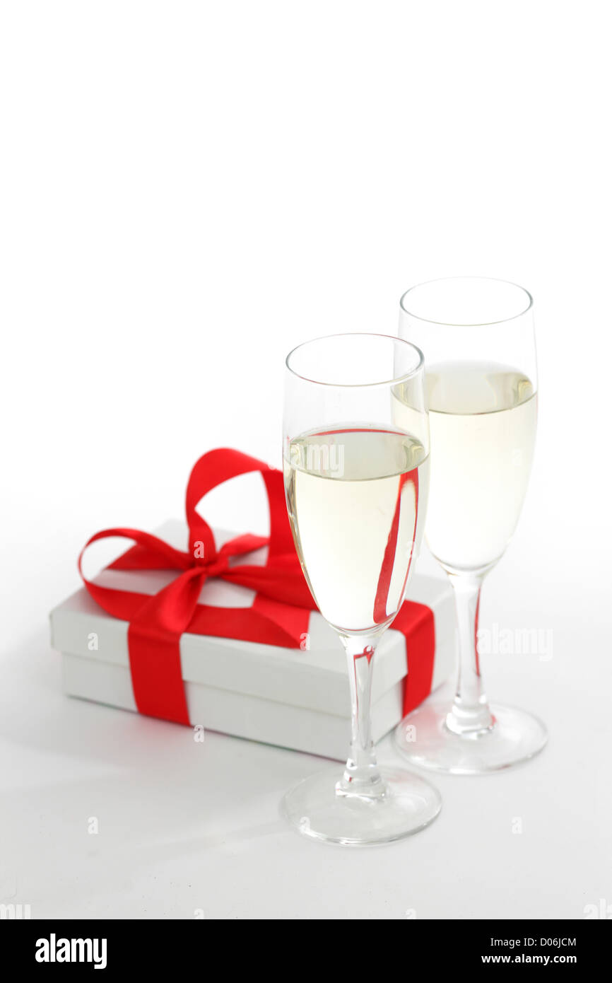 white gift with red ribbon Stock Photo - Alamy