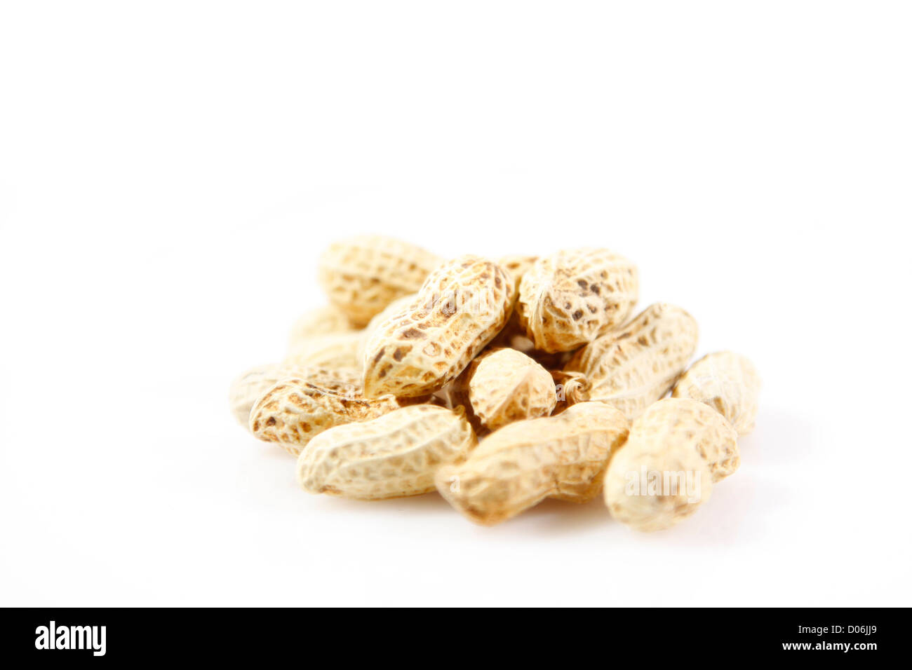 Peanuts isolated on white background Stock Photo - Alamy