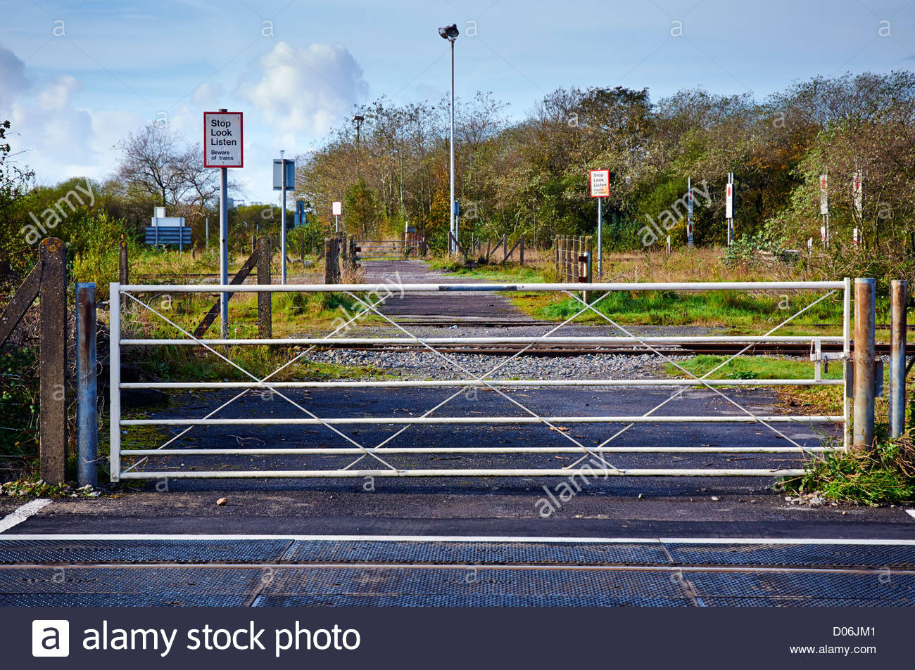 Railroad Crossing With Gates Stock Photos & Railroad Crossing With ...