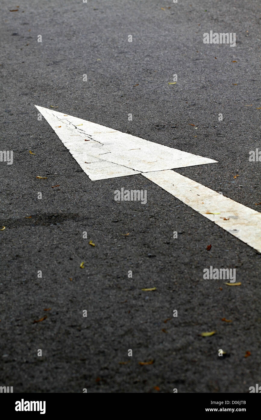 Moving forward arrow sign on the floor Stock Photo - Alamy