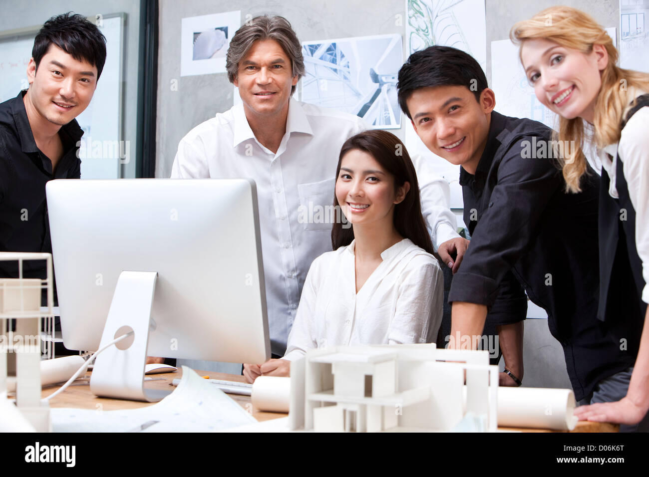 Architects working in studio Stock Photo - Alamy
