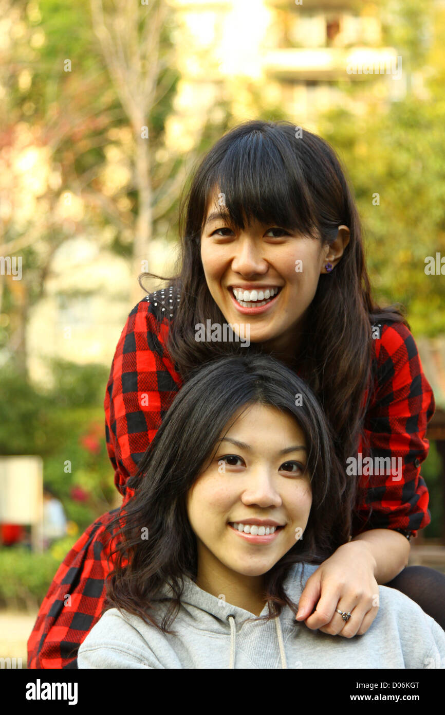 Asian university friends Stock Photo - Alamy