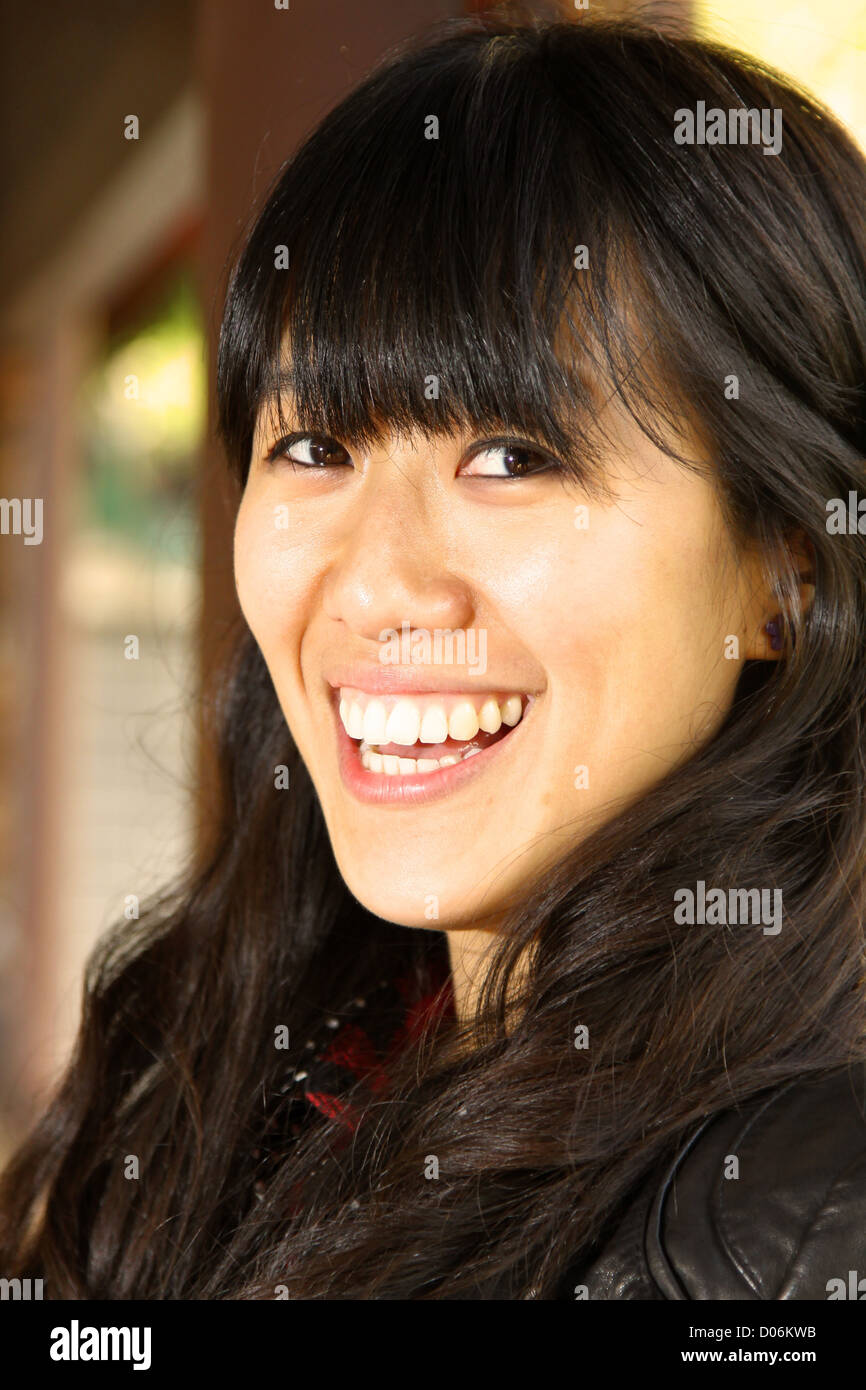Asian woman with smiling face Stock Photo - Alamy