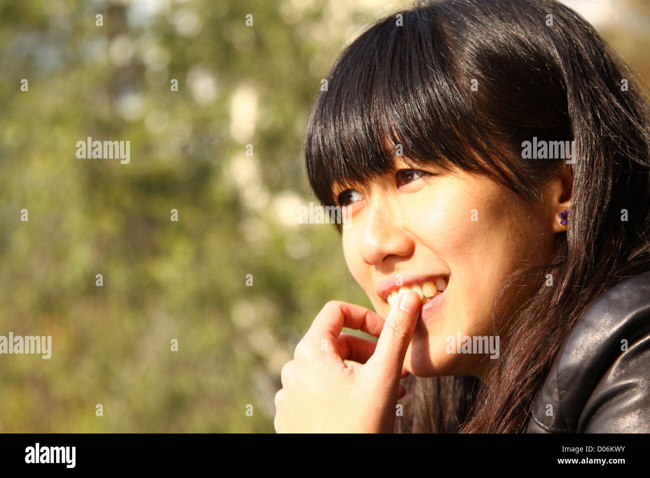 Asian woman with smiling face Stock Photo - Alamy