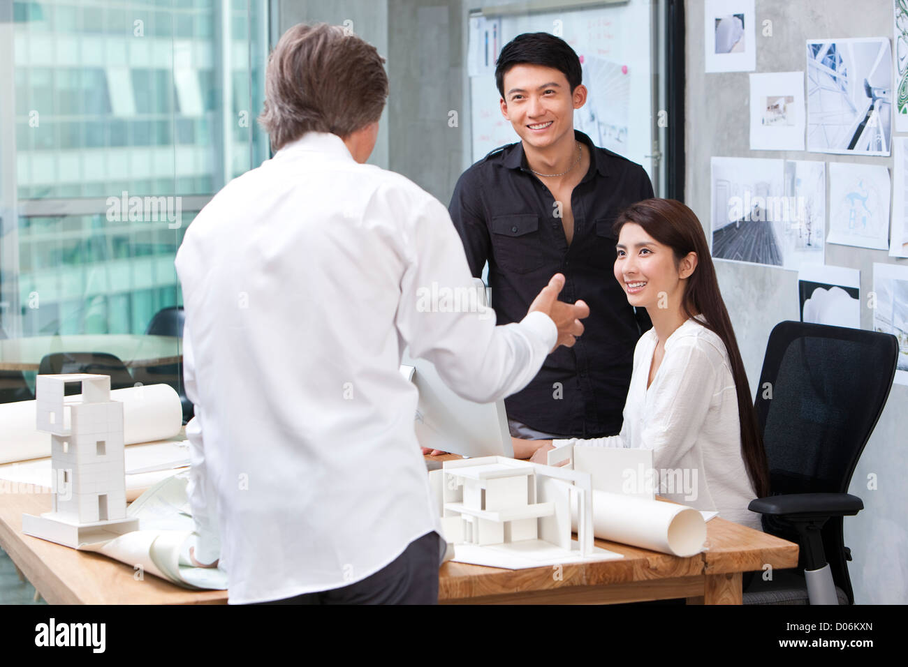 Architects working in studio Stock Photo - Alamy