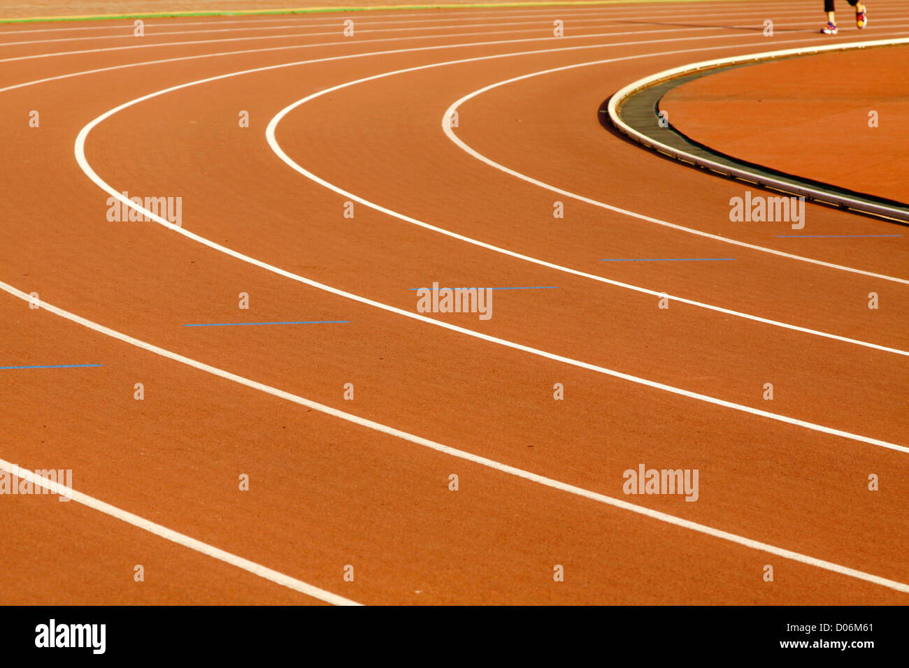 Running track in a curve shape Stock Photo - Alamy