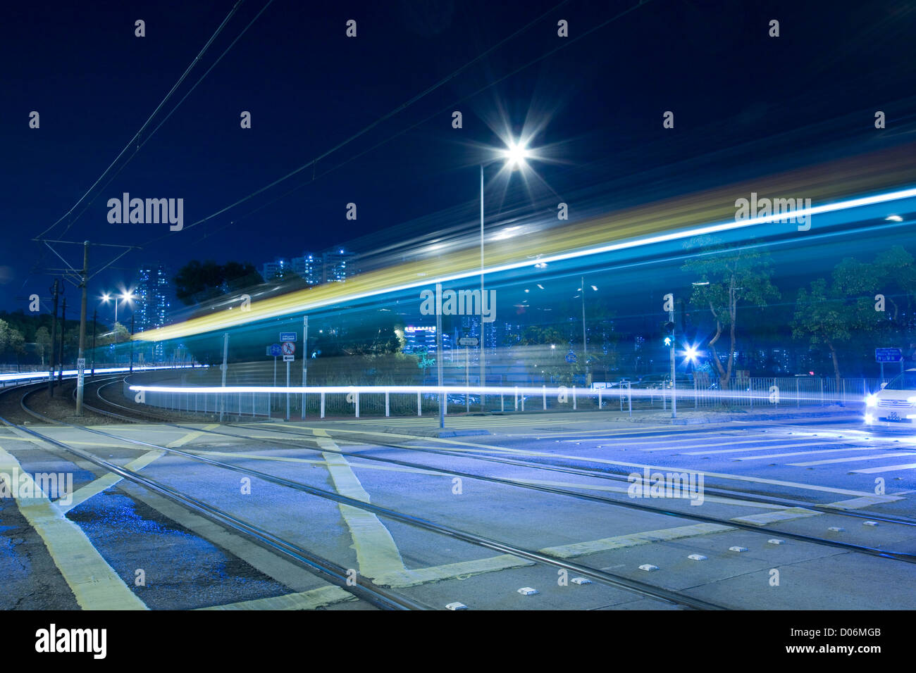 Light rail in Hong Kong at night Stock Photo - Alamy