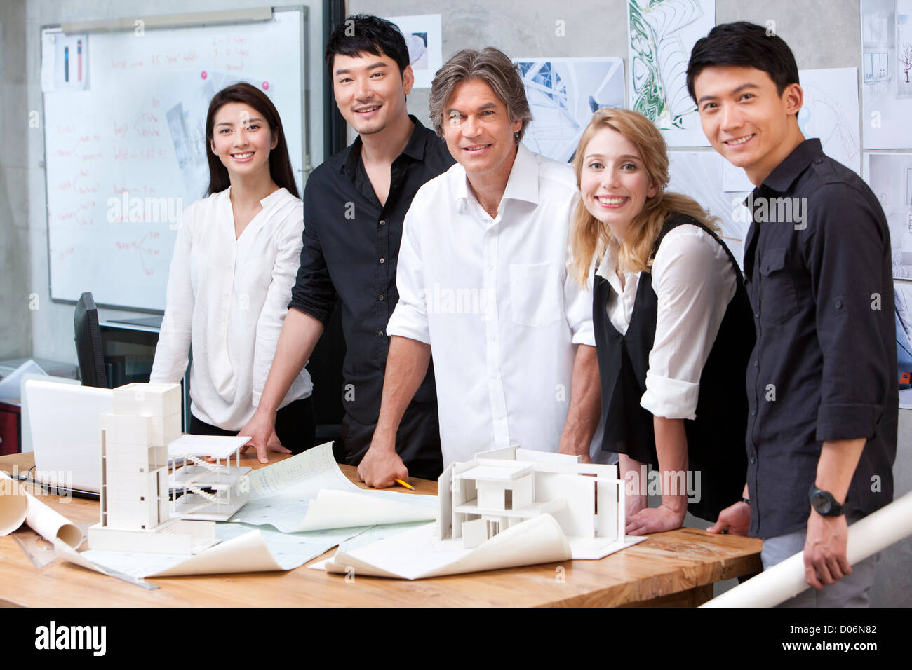 Architects team working in studio Stock Photo - Alamy