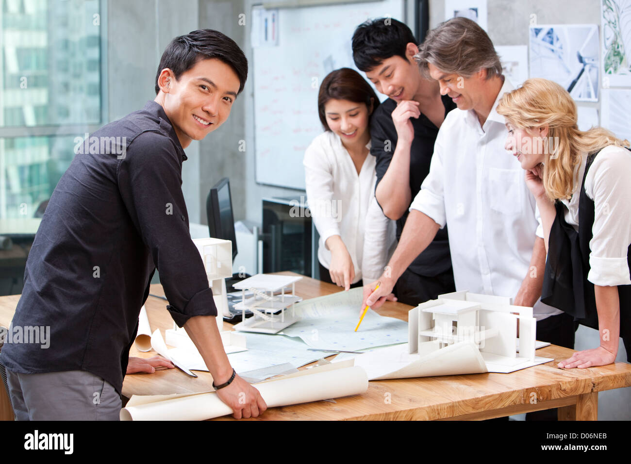 Architects working in studio Stock Photo - Alamy
