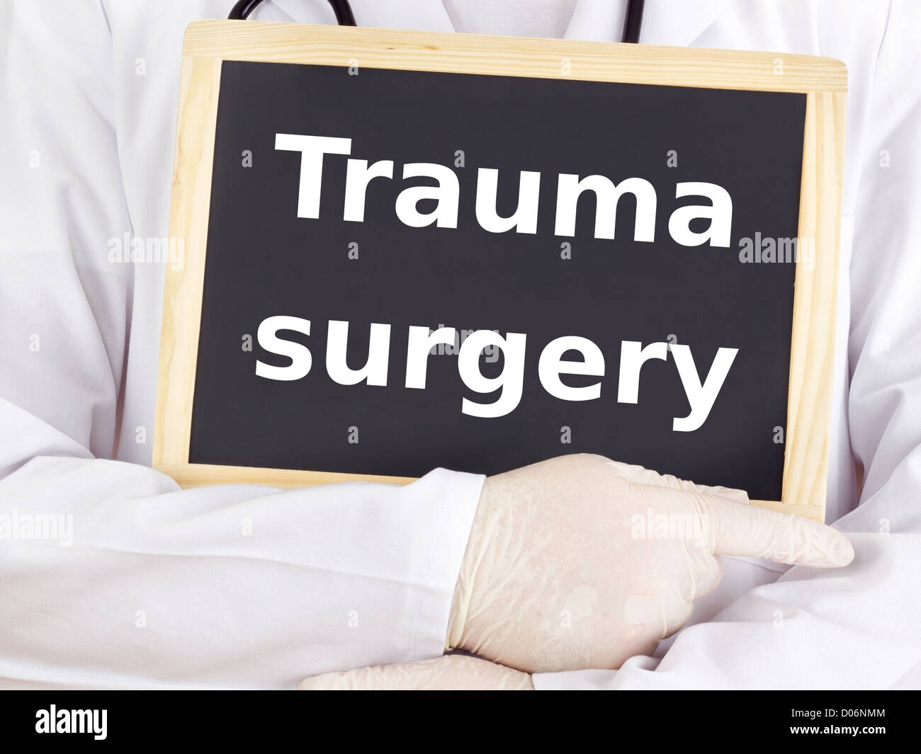 Doctor shows information: trauma surgery Stock Photo - Alamy