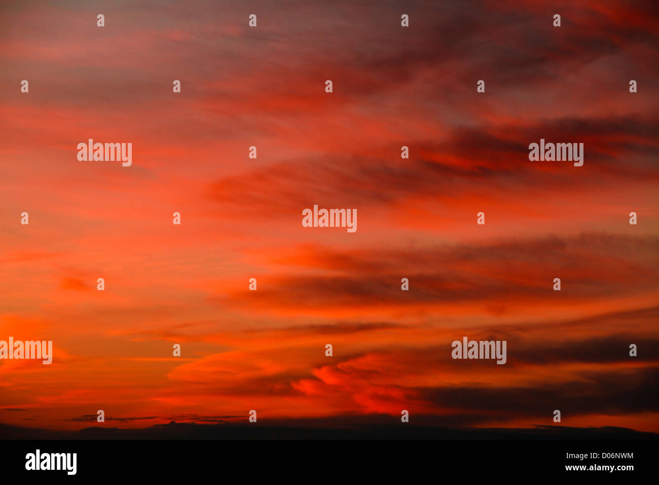 Dramatic red clouds at sunset Stock Photo - Alamy