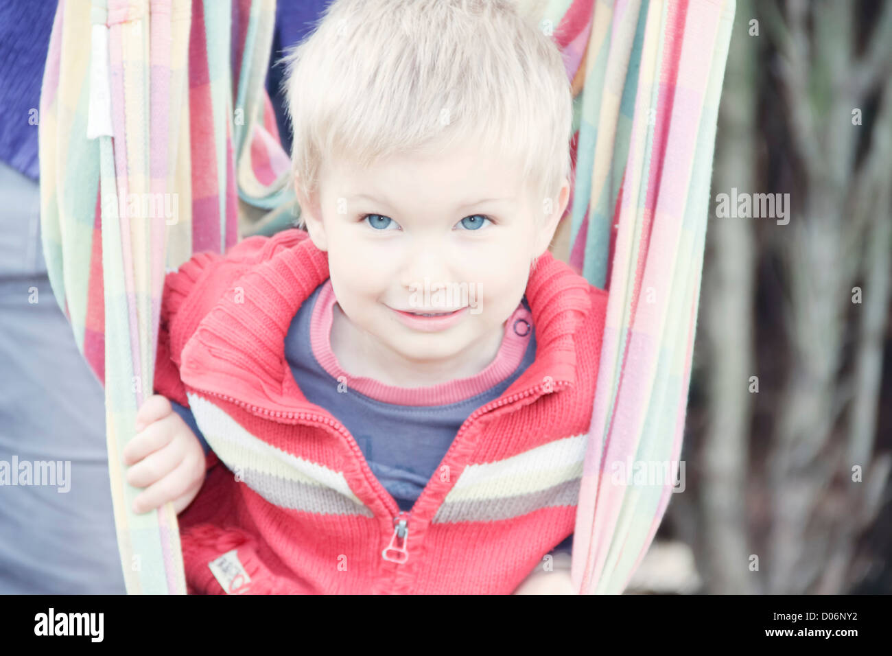 Boy looking up and smiling, outdoors Stock Photo - Alamy
