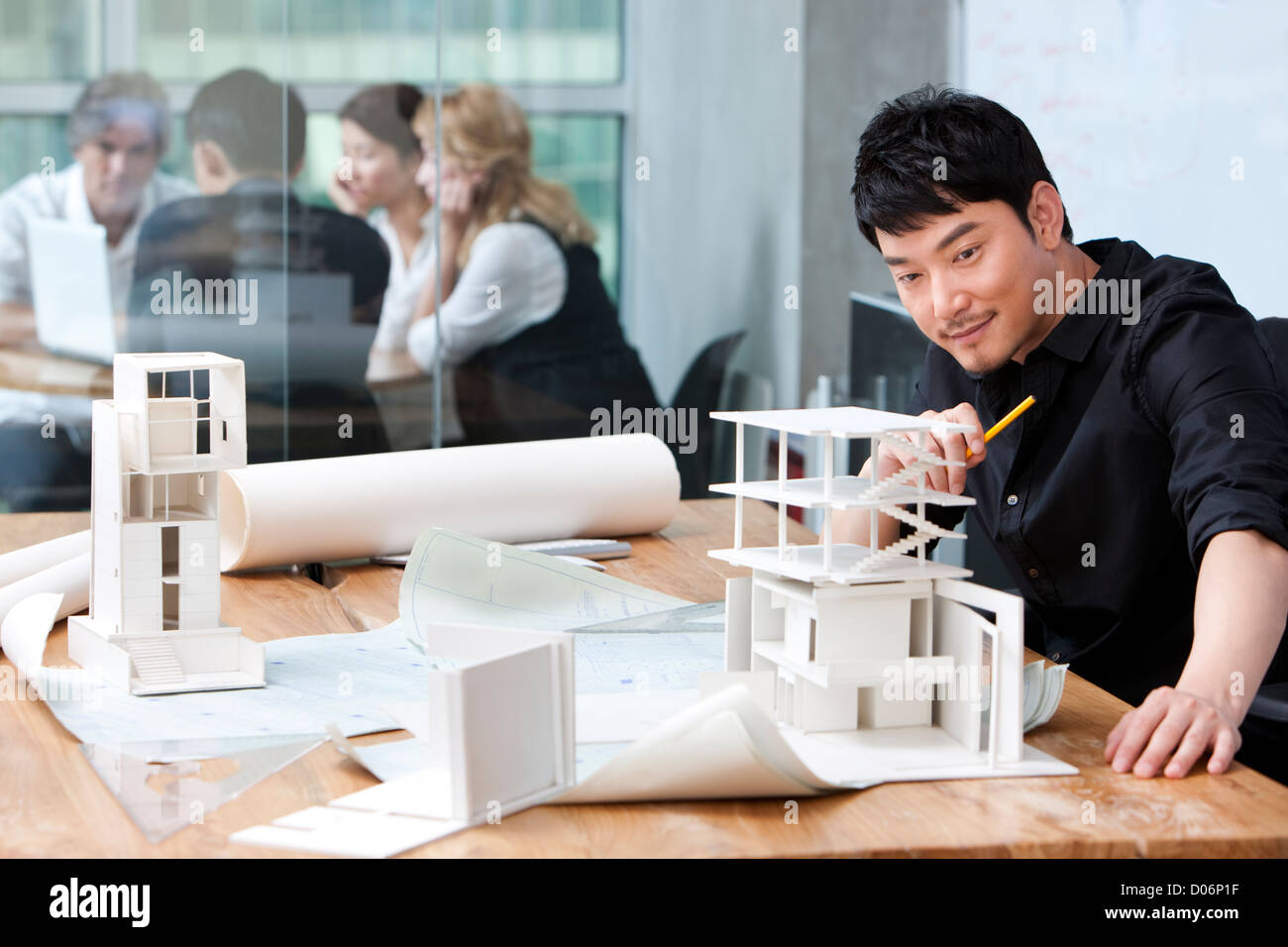 Architect and architectural model Stock Photo - Alamy