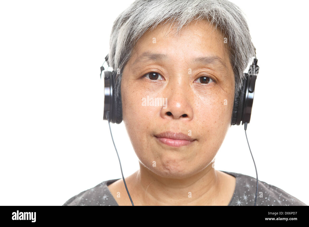 mature woman listen music Stock Photo - Alamy