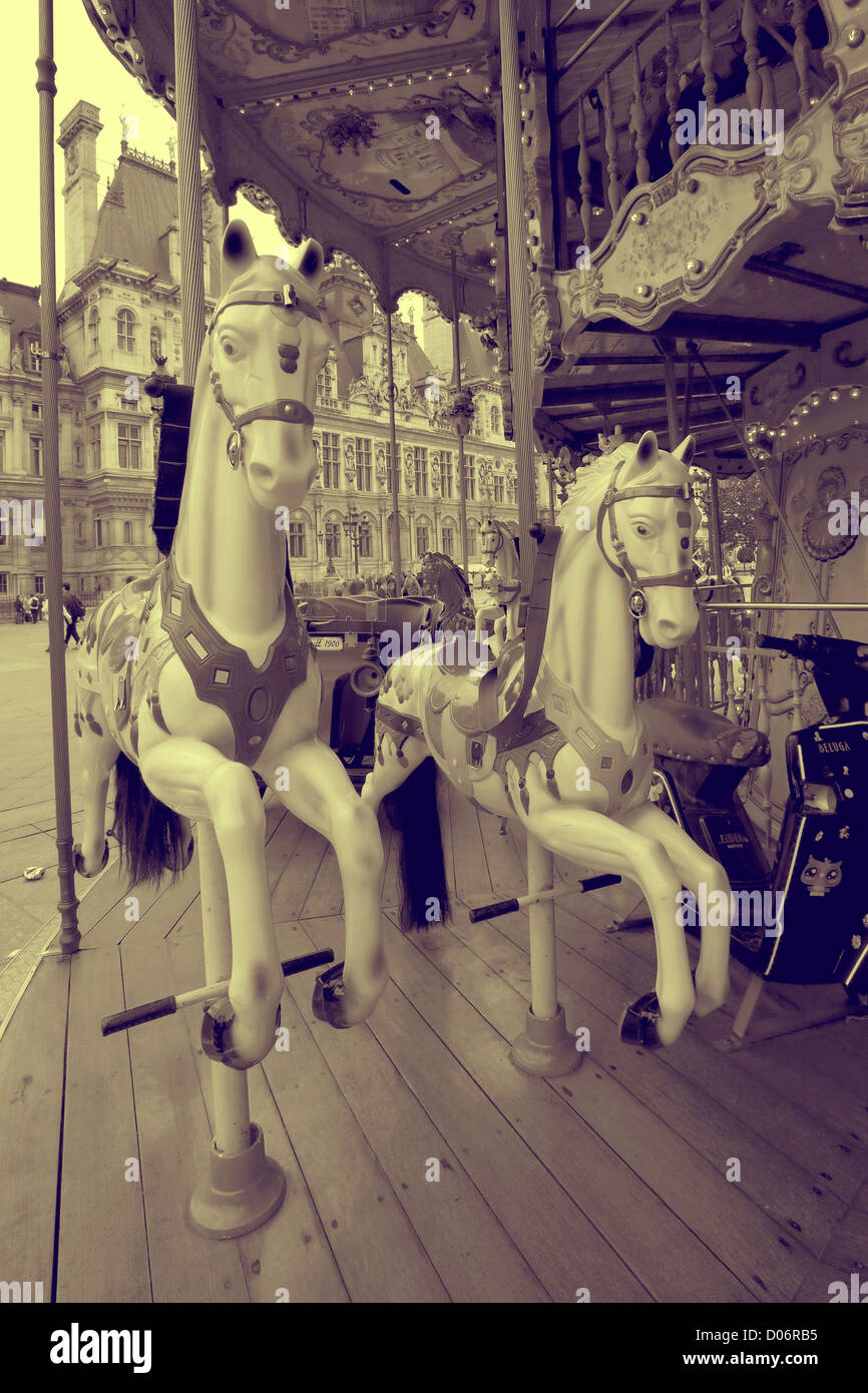 French carousel horse ride in vintage style Stock Photo - Alamy